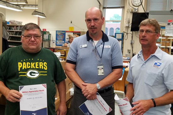 Postal Employees Honored - Monroe Times