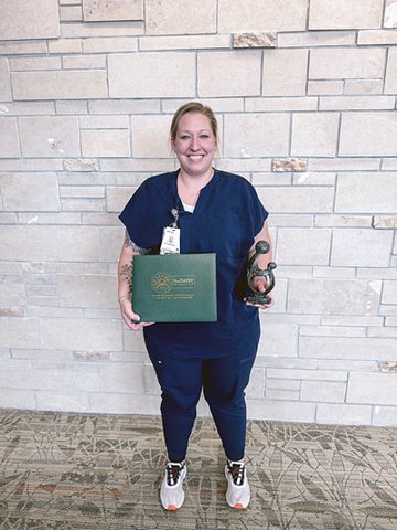 Whalen, RN, recipient of DAISY Award - Monroe Times