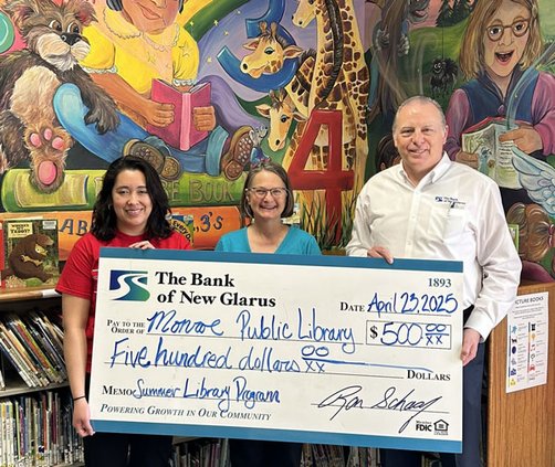 The Bank of NG makes donations to local libraries - Monroe Times