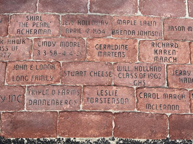 Engraved bricks installation at Darlington Depot - Monroe Times