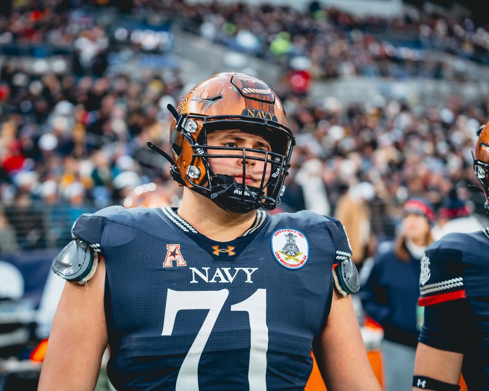 Bunker, Navy win Liberty Bowl Trophy - Monroe Times